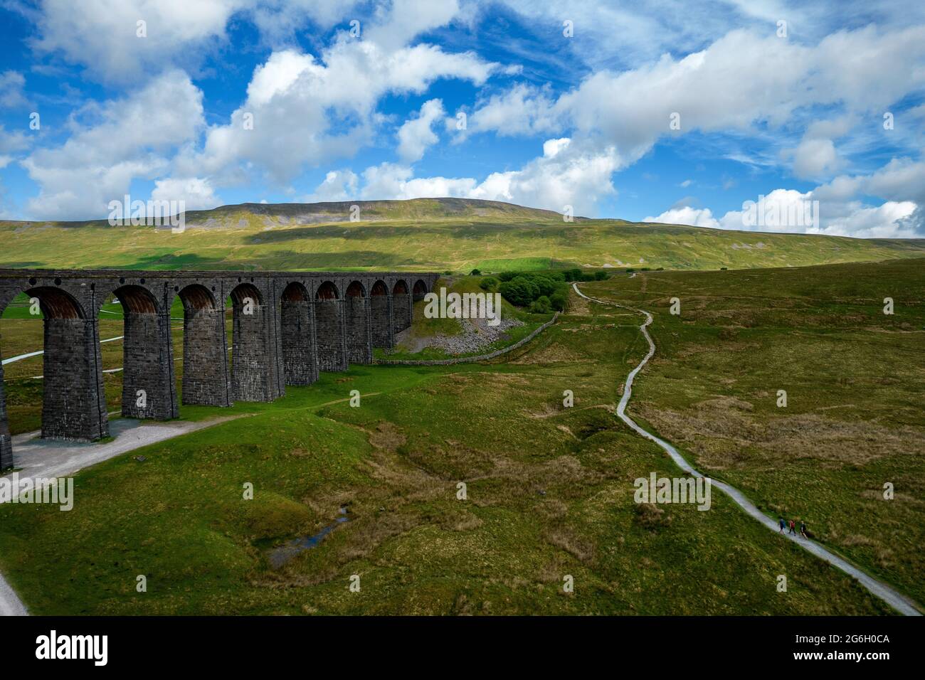The Ribblehead viaduct in Yorkshire at the bottom of the Whernside ...