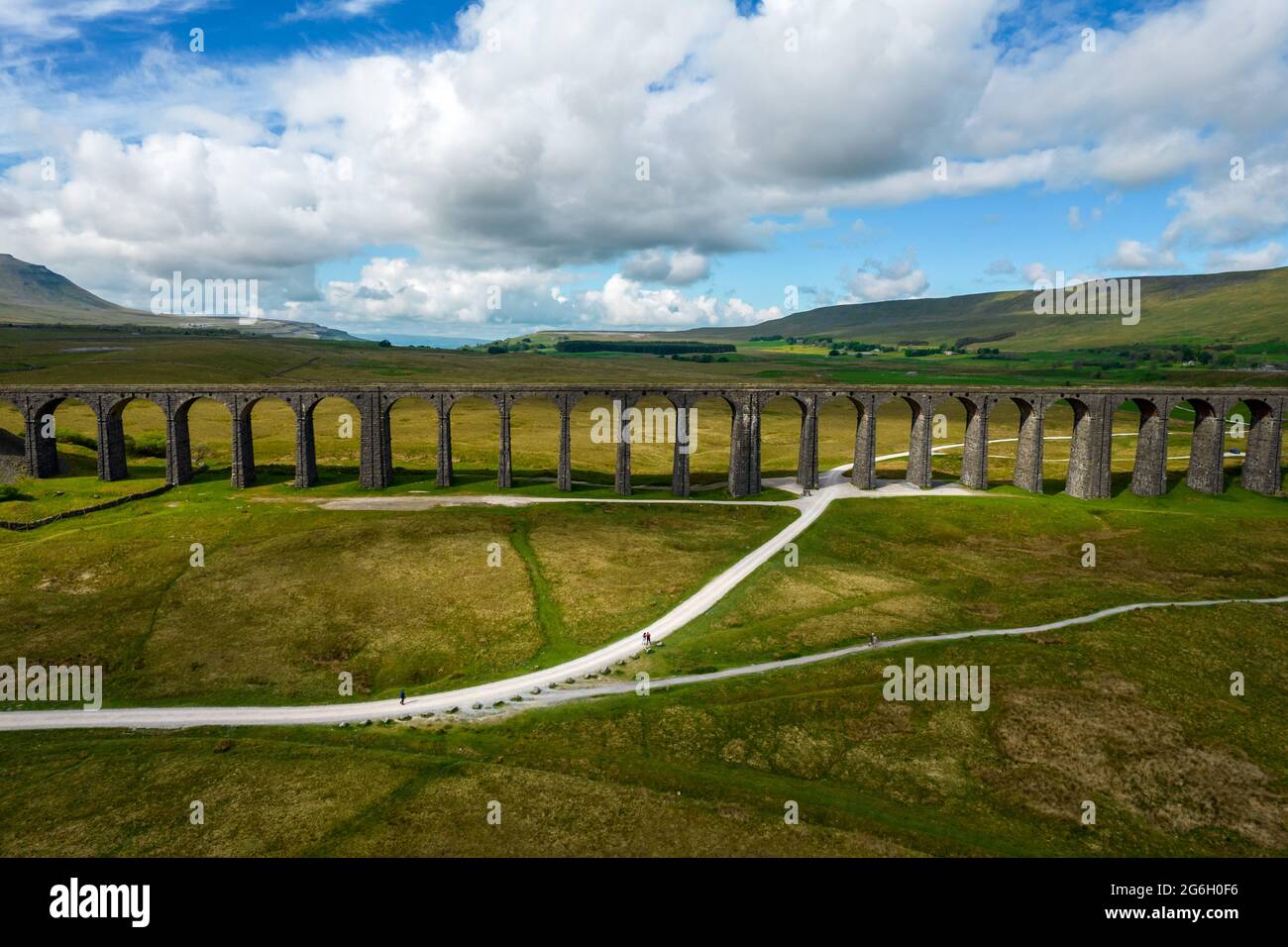 The Ribblehead viaduct in Yorkshire at the bottom of the Whernside ...