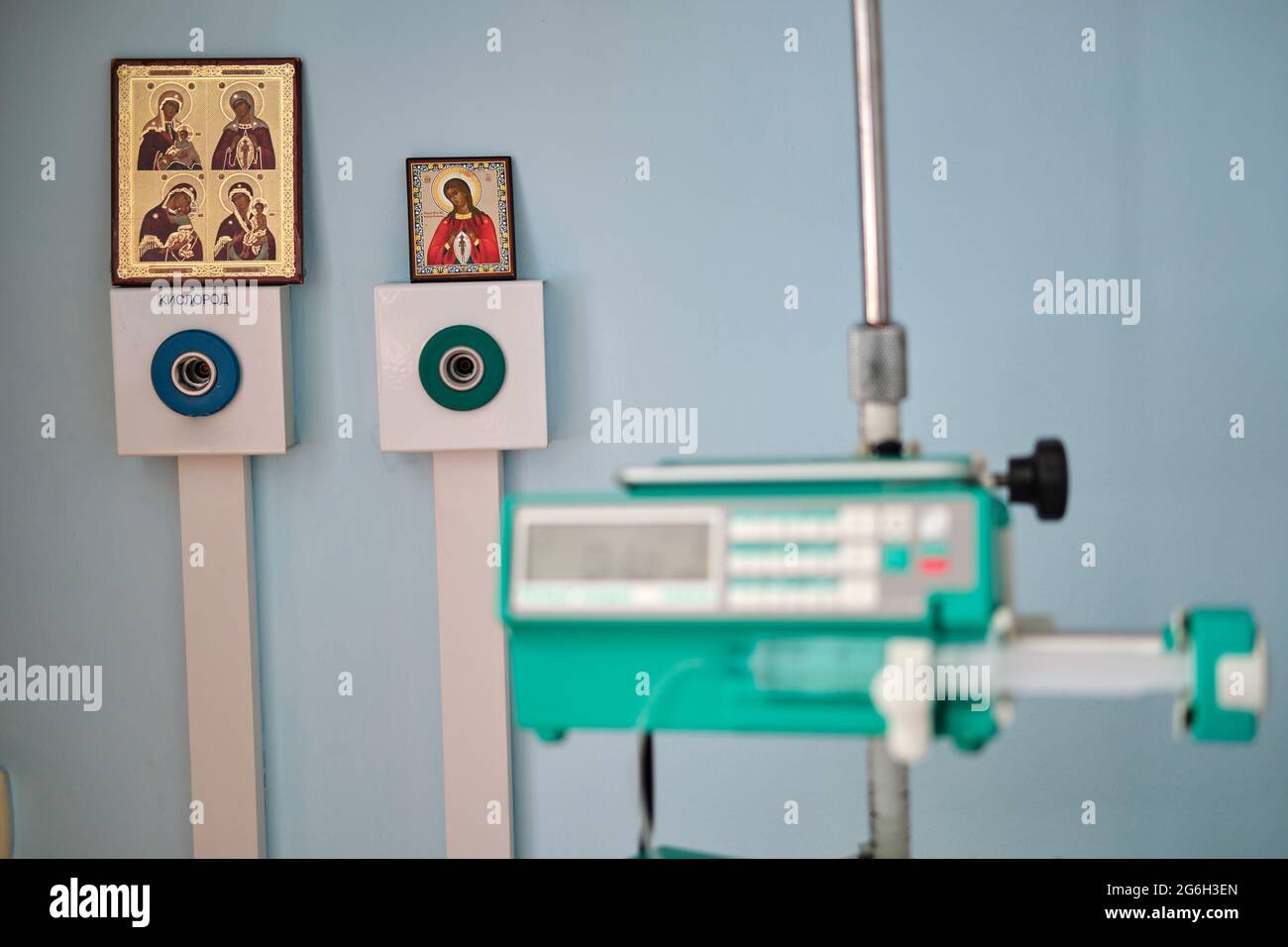 A syringe pump, a dropper for anesthesia and drug administration during ...