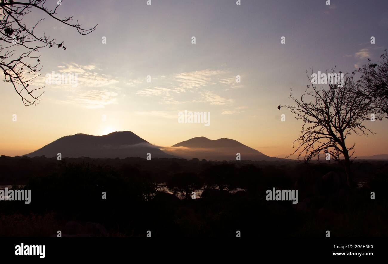 Dawn breaks over the Great Ruaha River in Ruaha National Park. The ...