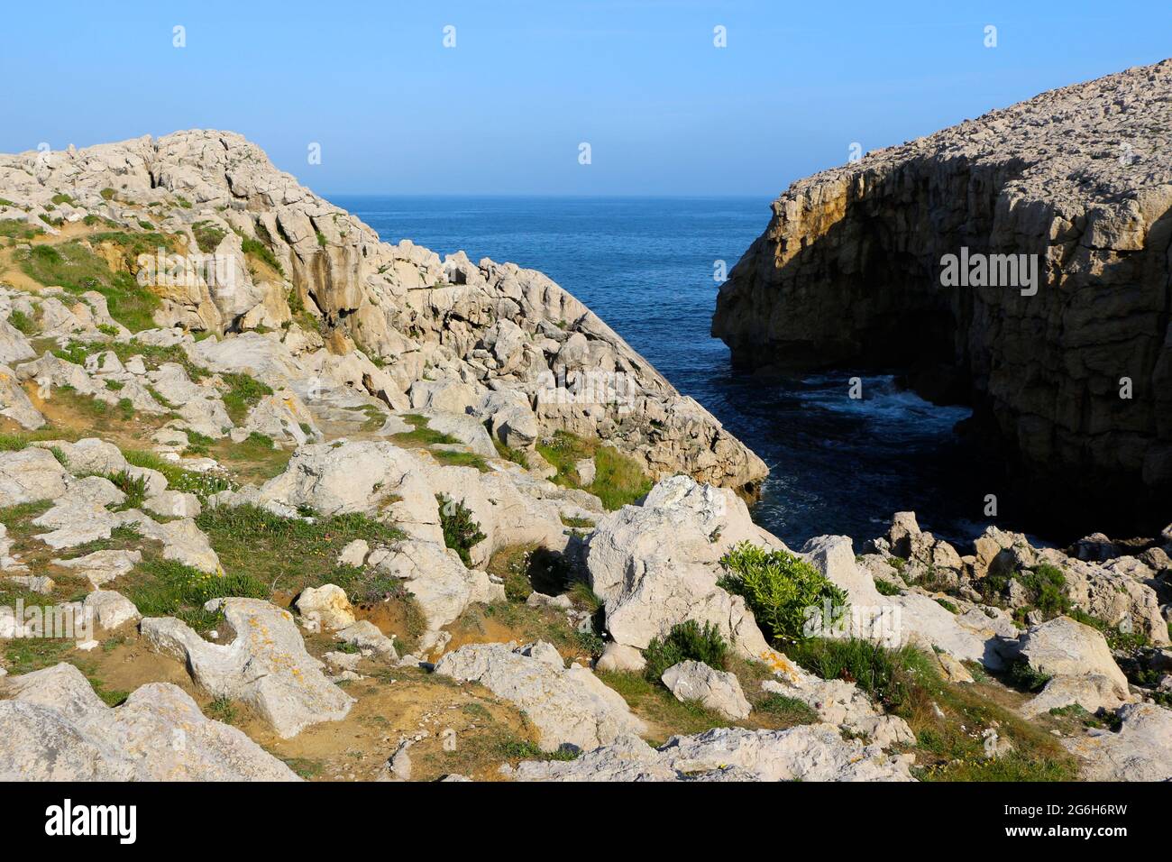 Rocky coastline with vertical cliffs Suances Cantabria Spain Stock ...