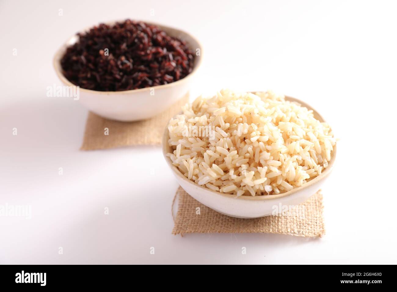 Organic boiled brown rice on bowl isolated in white background Stock ...