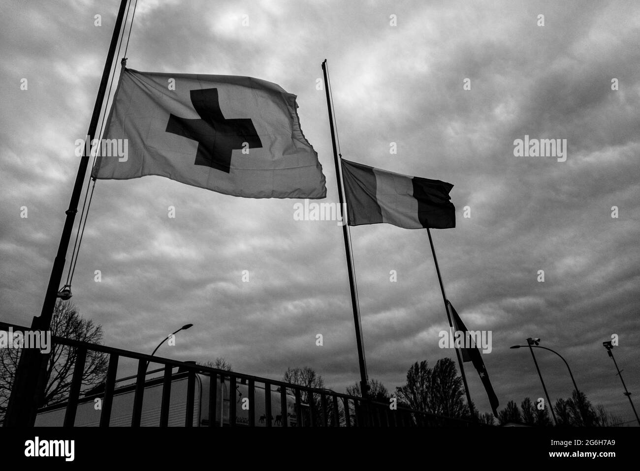 LUCCA, TUSCANY - ITALY 2020: italian flag and italian red cross flag at ...