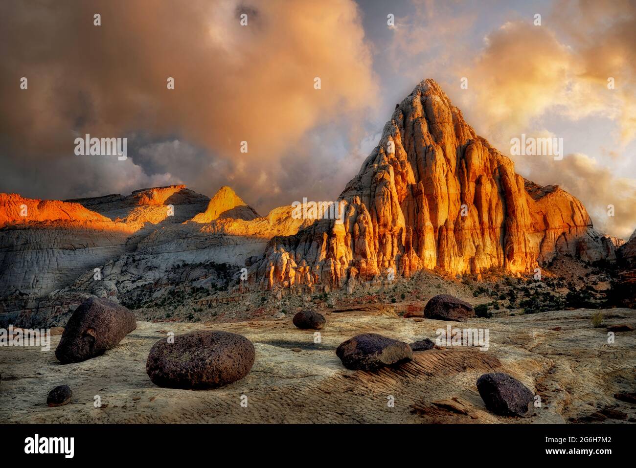 Pectol's Pyramid with glacial erratic boulders at sunset. Capitol Reef ...