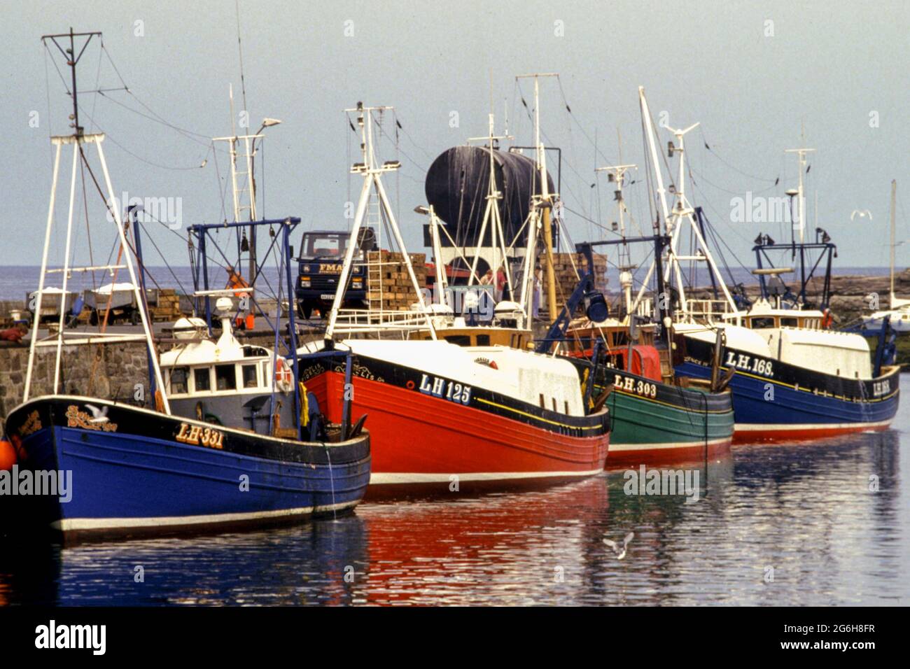 Fishing boats at Seahouses Harbour in 1984 Stock Photo - Alamy