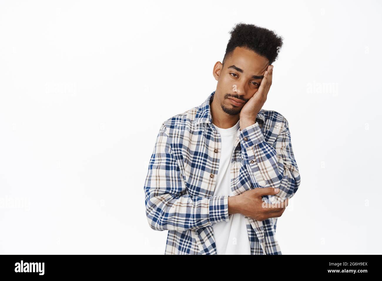 Bored african american male student, guy looking unamused at smth ...