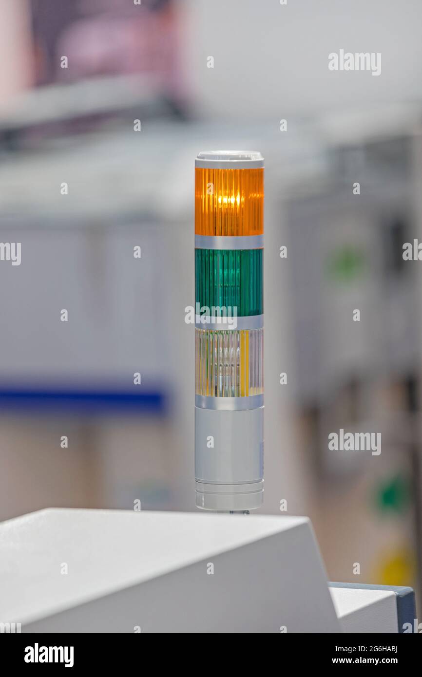 Yellow Signal Tower Light at Machine Production Caution Stock Photo - Alamy