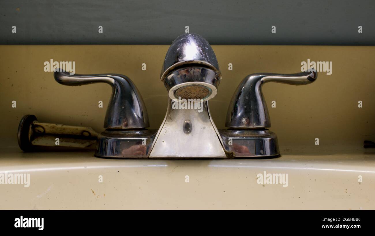 A Close Up of a Faucet in a Bathroom Stock Photo - Alamy