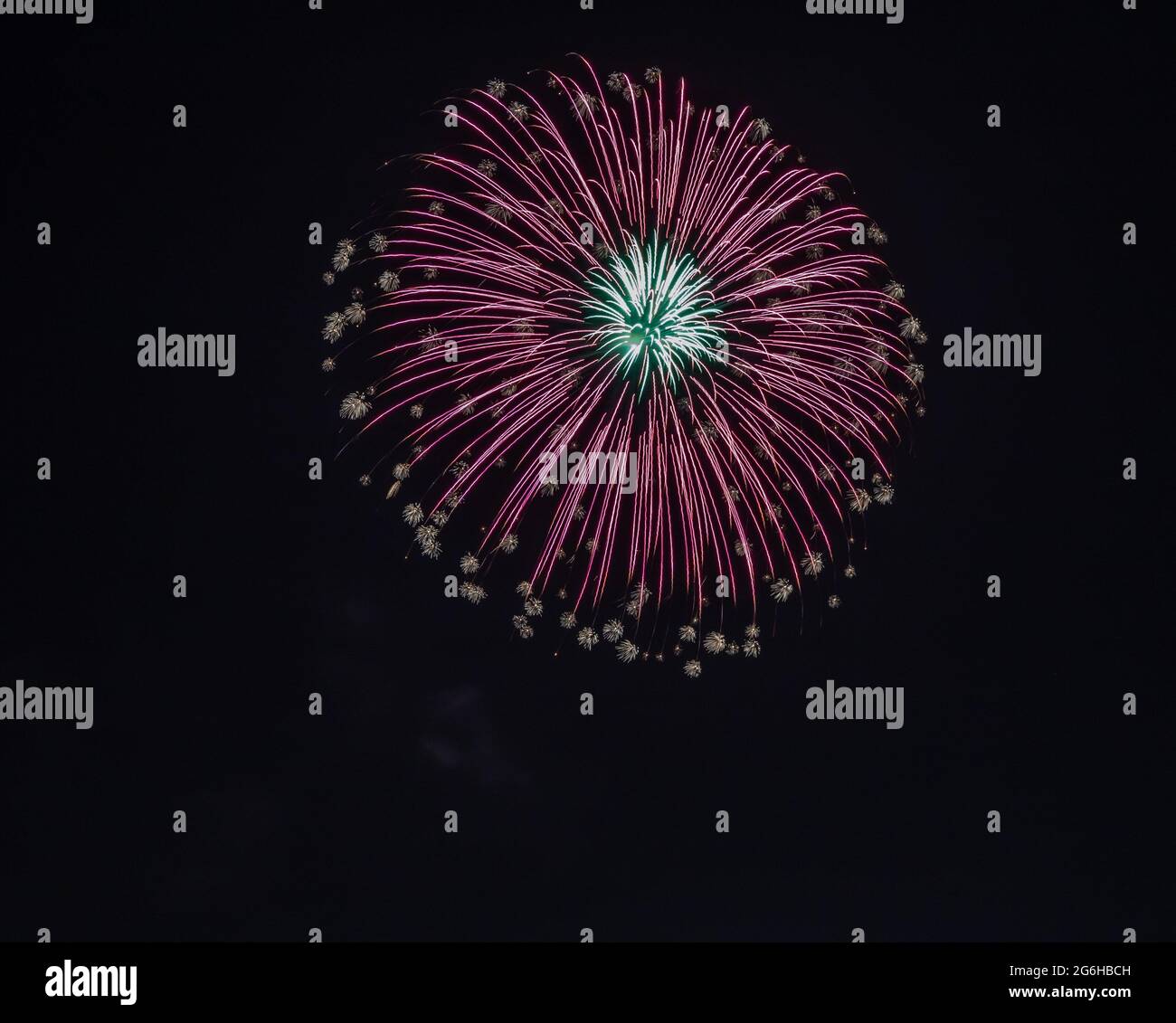 Exploding bright red firework hi-res stock photography and images - Alamy