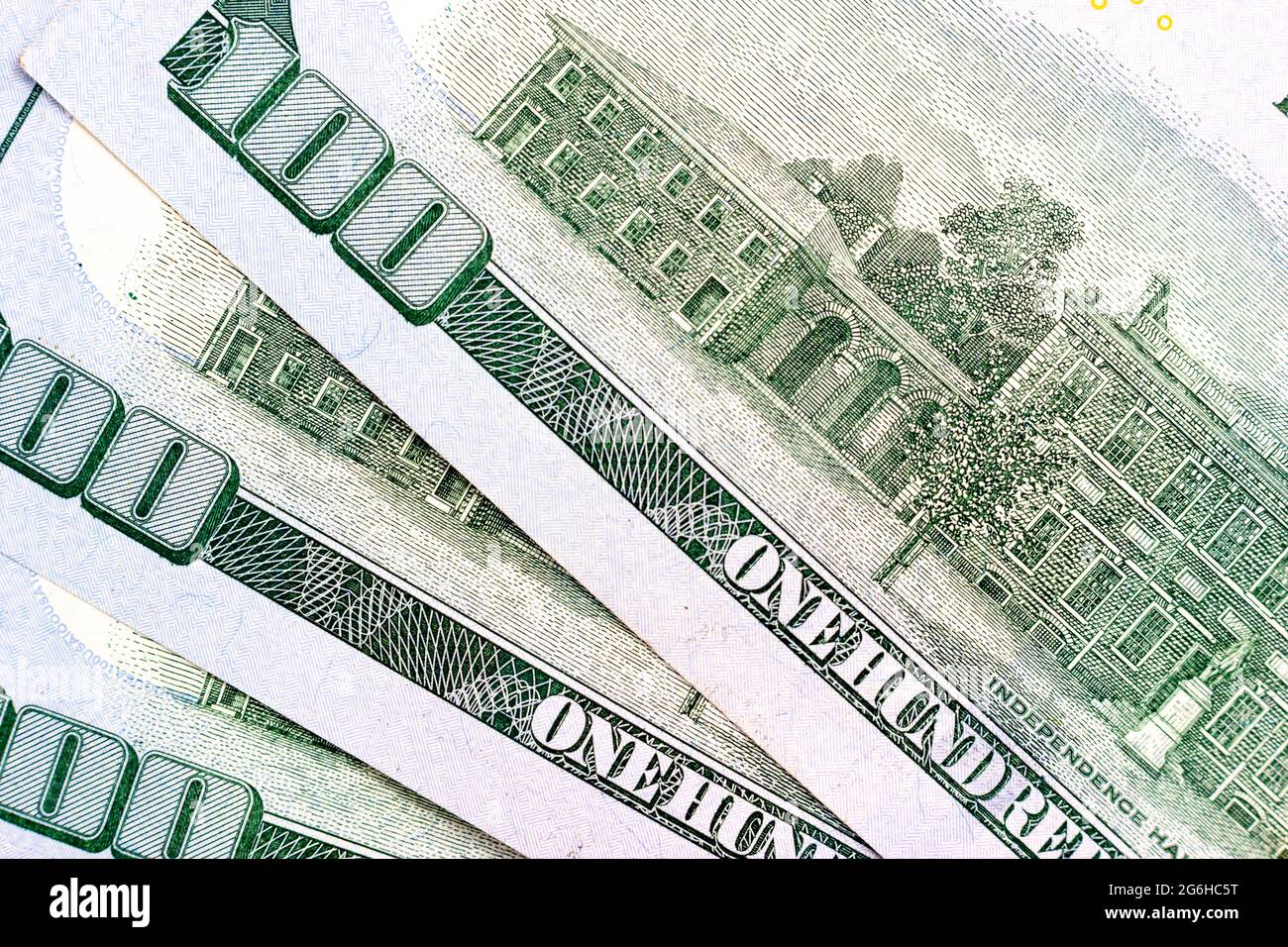 Reverse side of a hundred dollar bill. Several hundred dollar bills ...