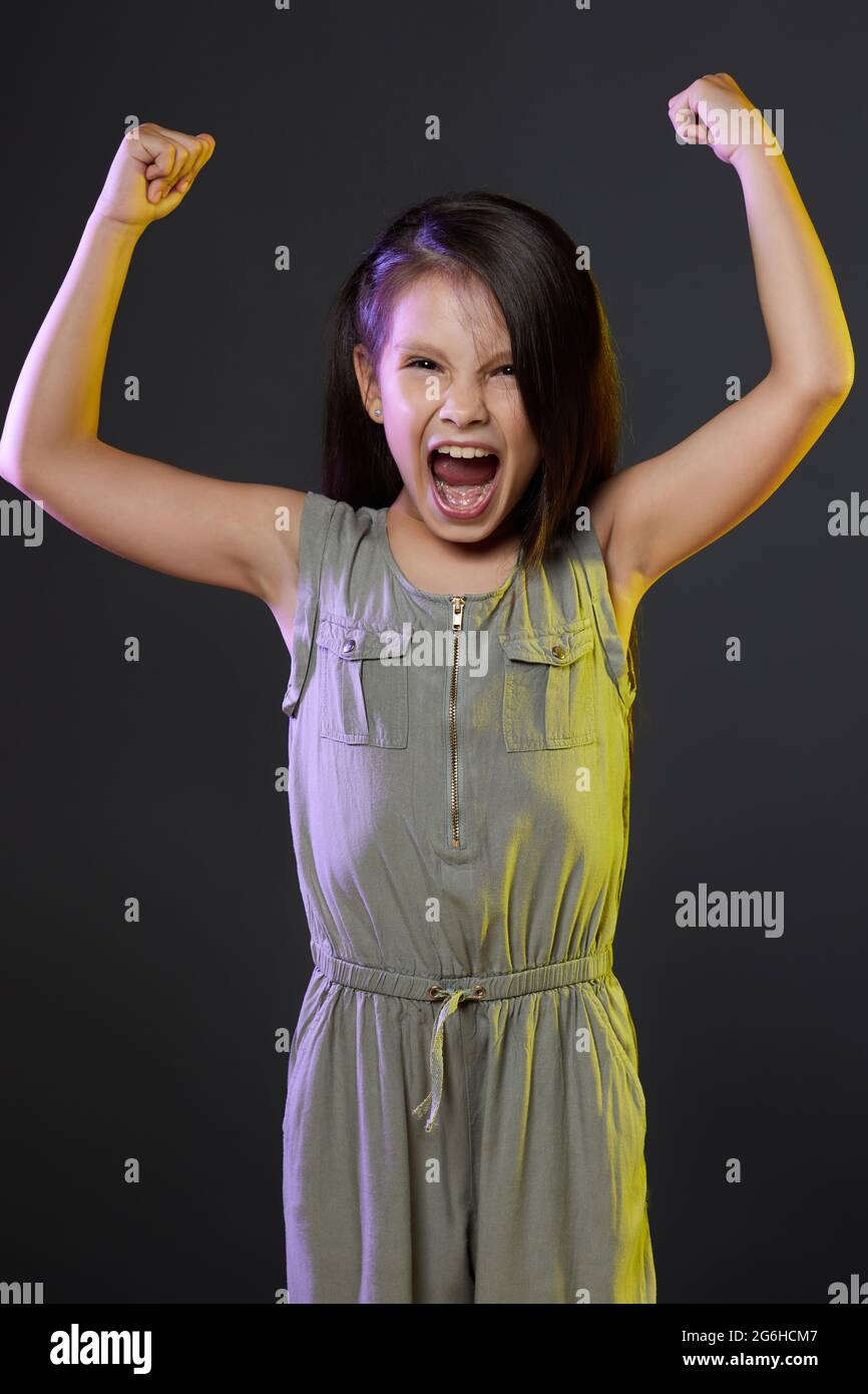 Child girl showing victory hand hi-res stock photography and images - Alamy