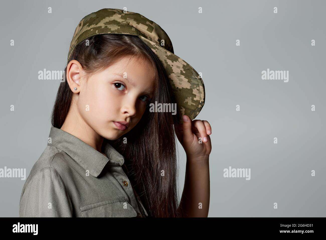 child girl wear military uniform. kid dressed like a soldier Stock ...
