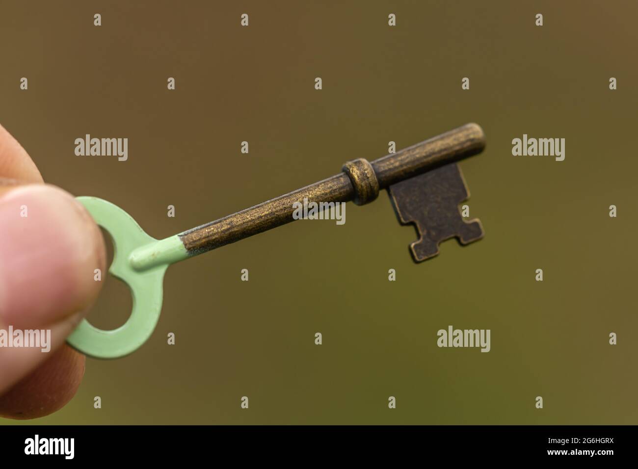 A person holds a key Stock Photo - Alamy