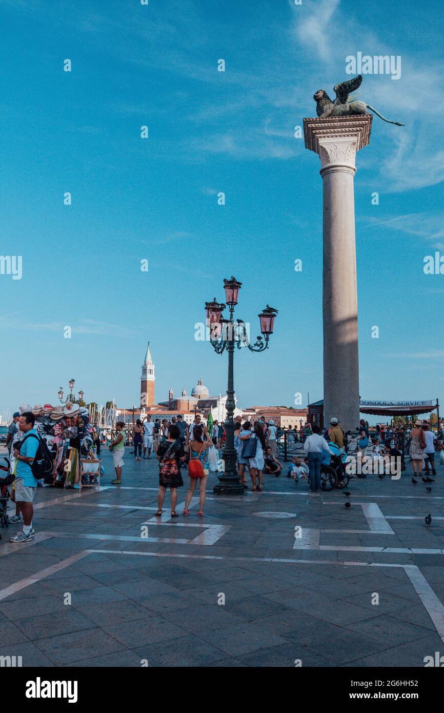 Lion statue on San Marko square in Venice, Italy. View of the Venice ...