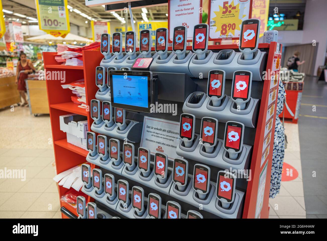 Interior view of ICA supermarket. Stand with customer scanners Stock ...