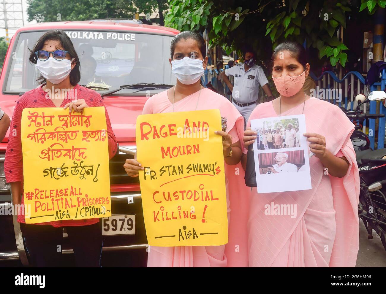 Nuns and other civil society members wearing masks display protest ...