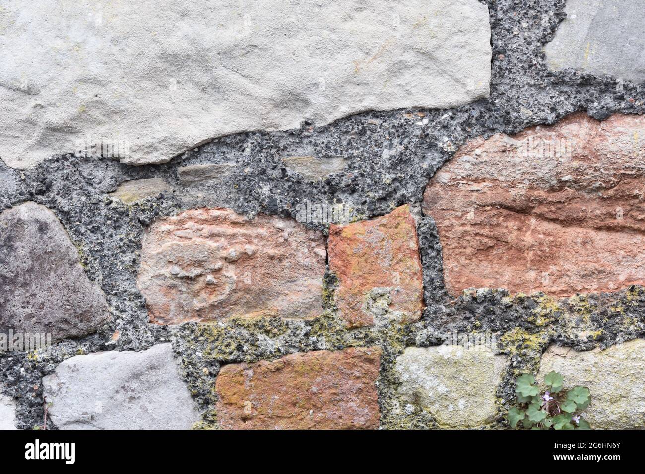 A textured stone coloured brick wall Stock Photo - Alamy