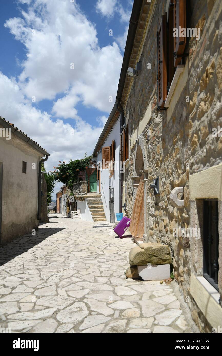 Rocchetta Sant'Antonio, Italy, July 3, 2021. A narrow street among the ...