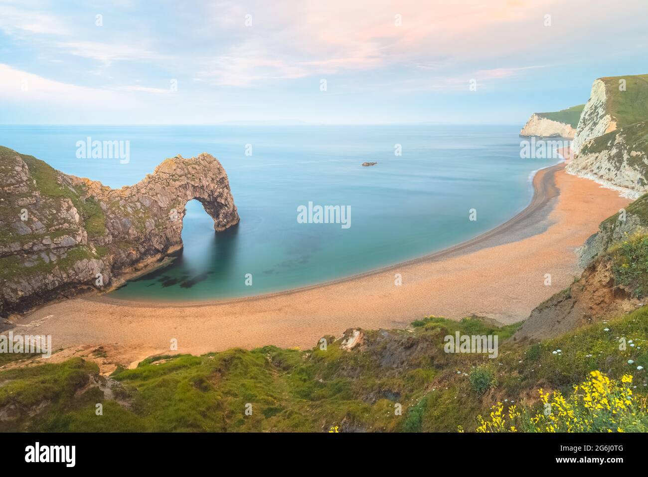 The iconic landscape seascape rock formation sea arch Durdle Door at ...