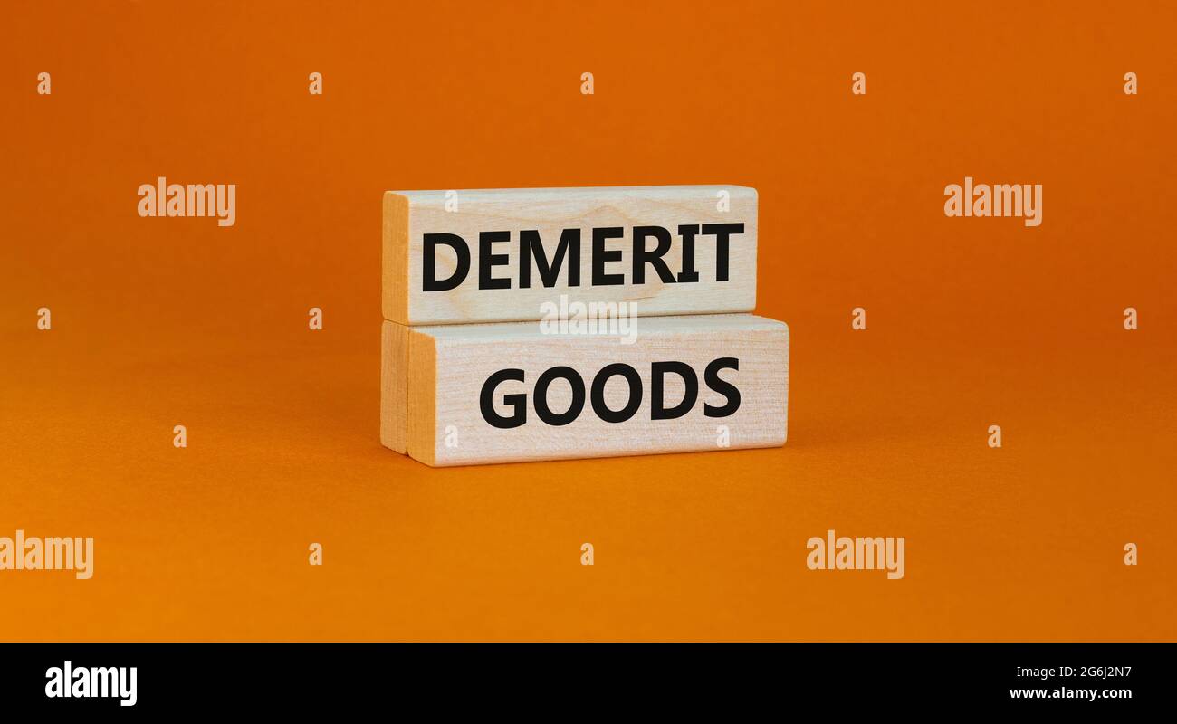 Demerit goods symbol. Wooden blocks with words Demerit goods on ...