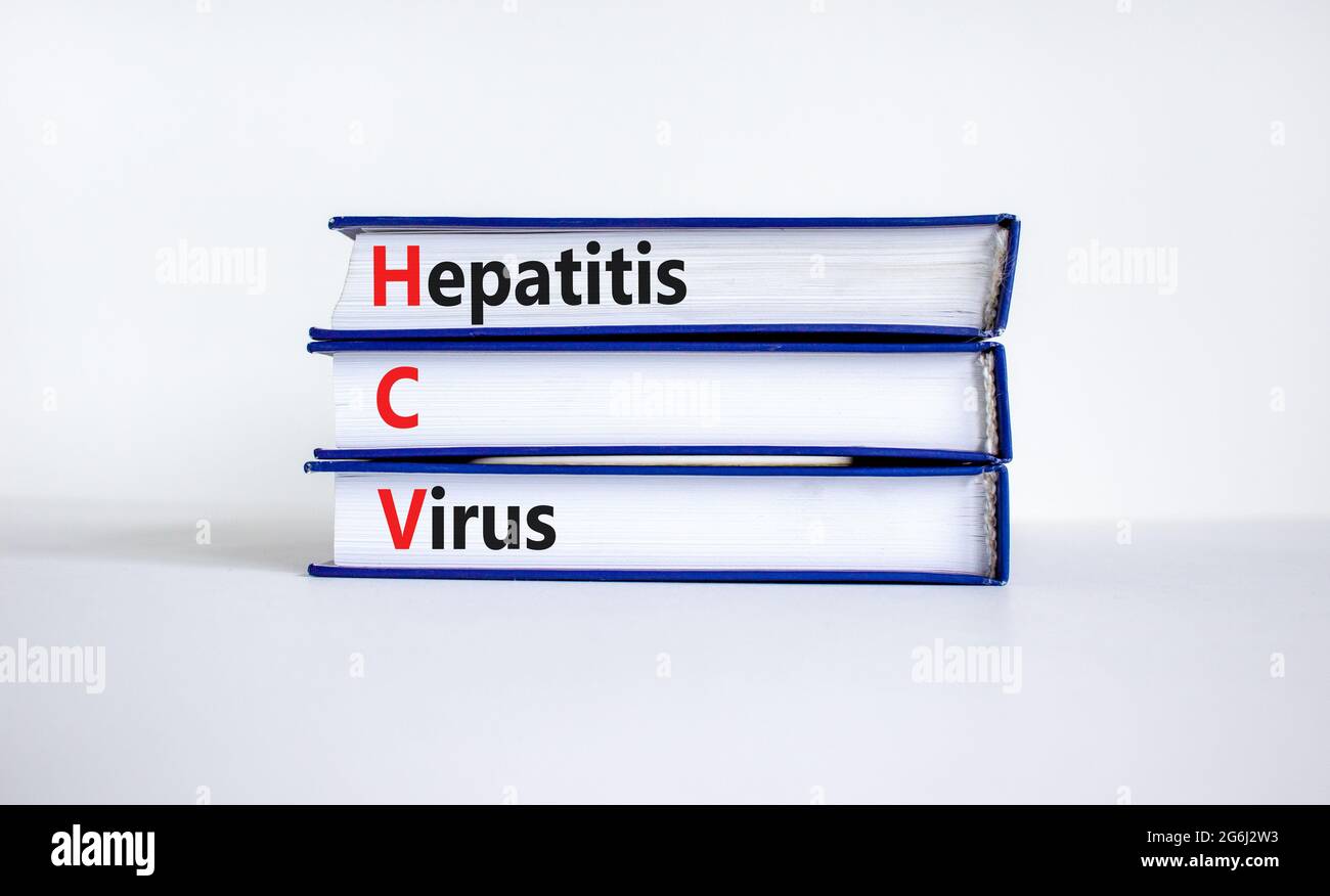 HCV, hepatitis C virus symbol. Medical books with words HCV, hepatitis ...