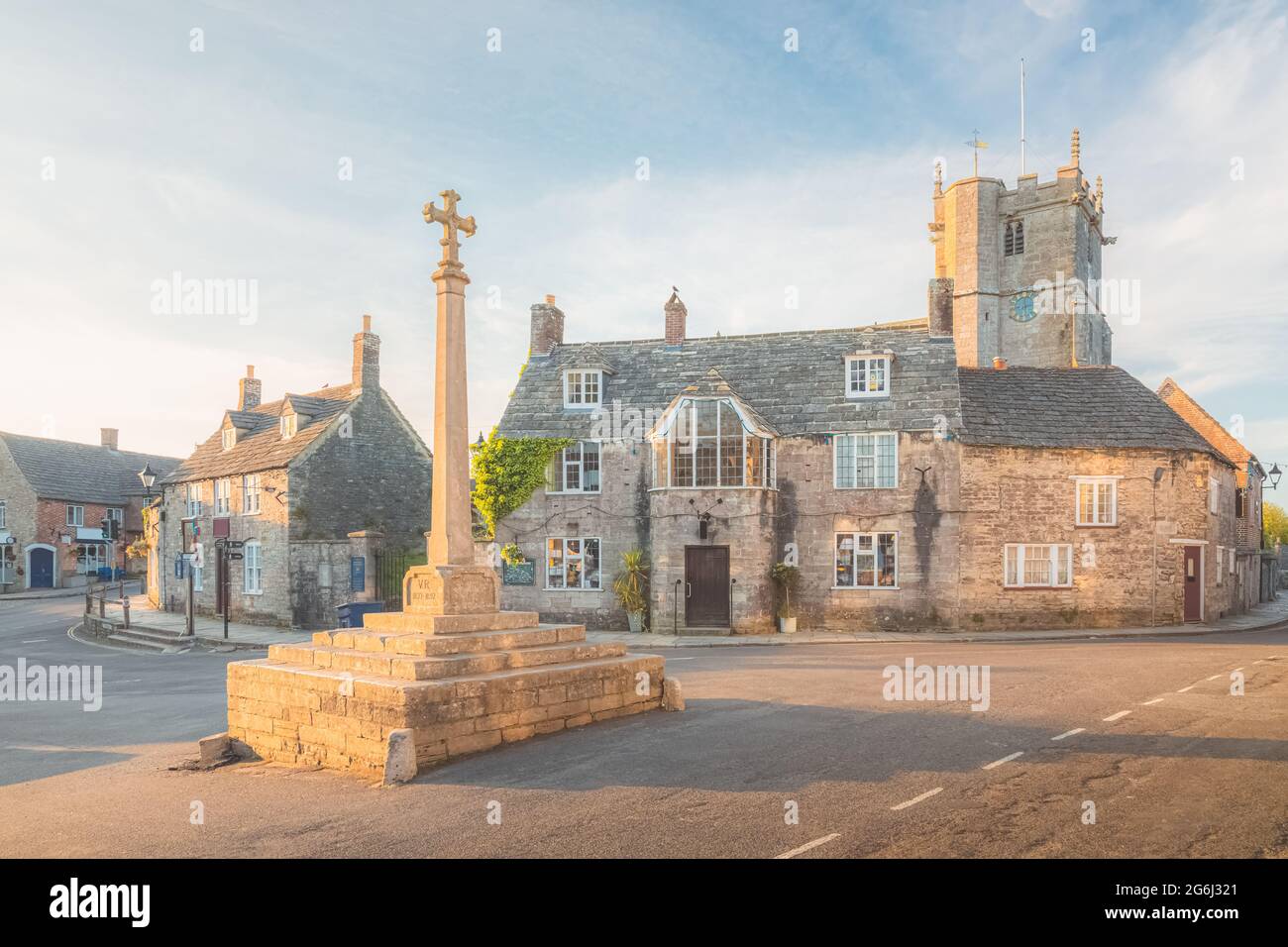 Quaint, historic medieval village of Corfe Castle, Dorset, England with ...