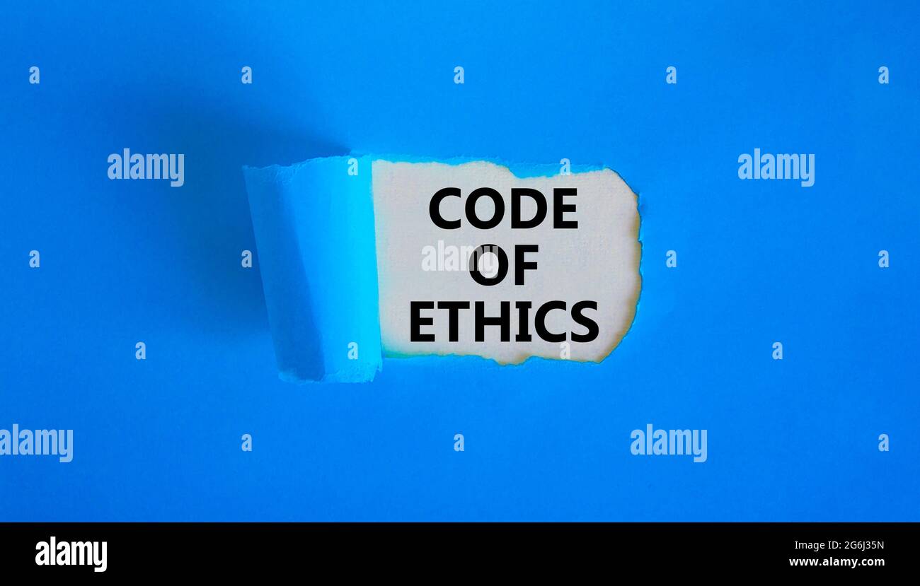Code of ethics symbol. Words 'Code of ethics' appearing behind torn ...