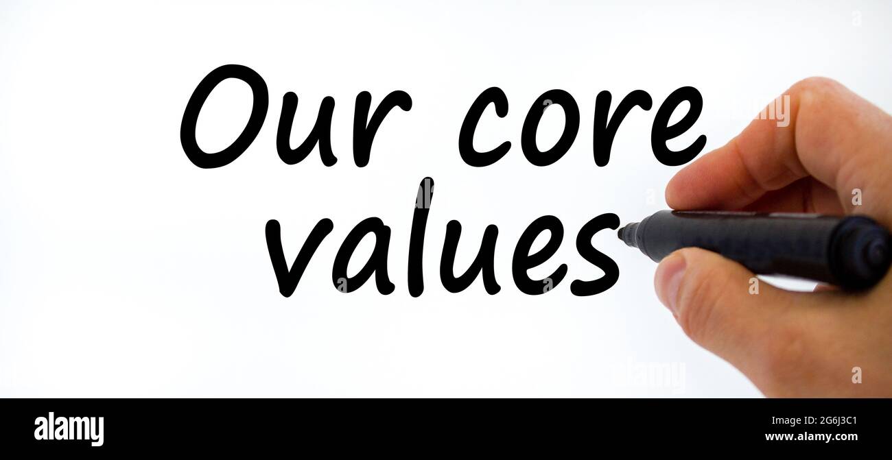 Our core values symbol. Businessman writing 'Our core values', isolated ...