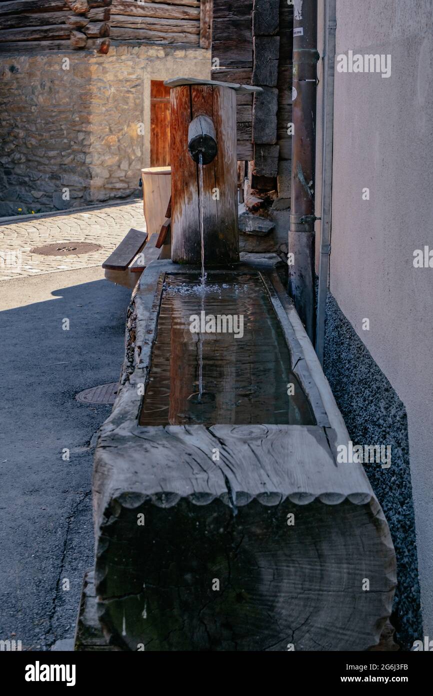 Water Fountain Carved in Wood - Swiss Alps - Zermatt, Switzerland Stock ...