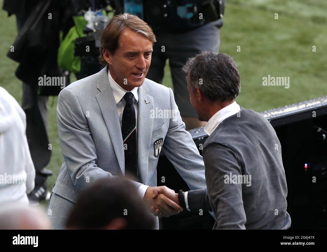Italy manager Roberto Mancini (left) greets Spain manager Luis Enrique ...