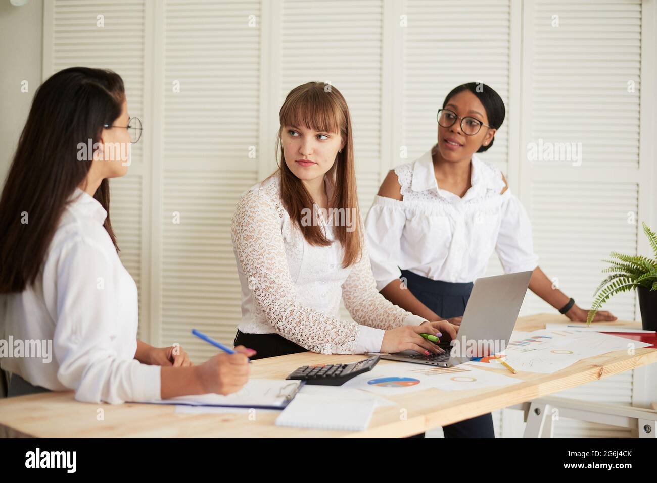 Group of diverse business women leaders working together at the office ...
