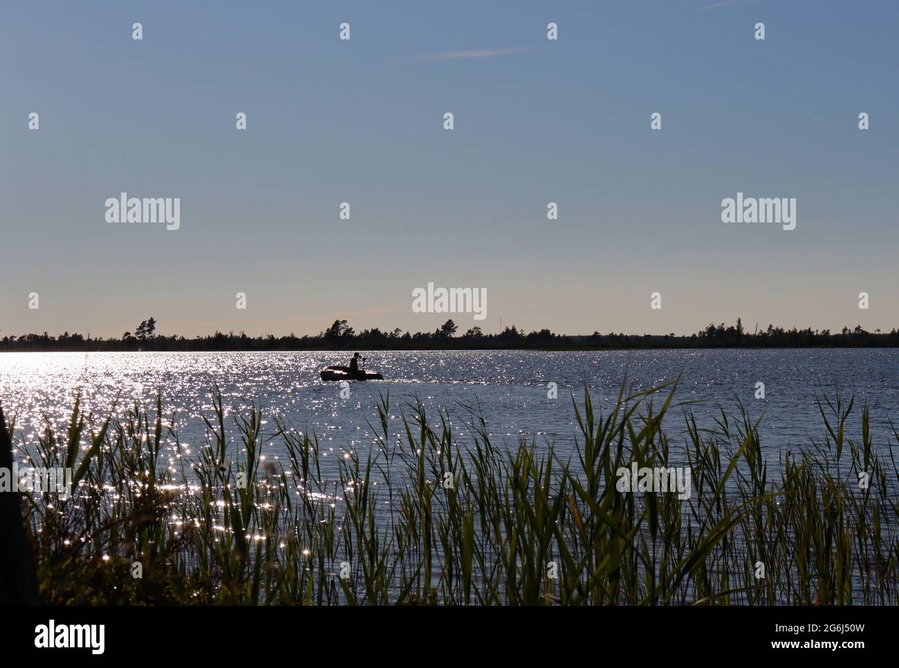 Camp on a lake by a campfire in summer in the baltics, hot days Stock ...