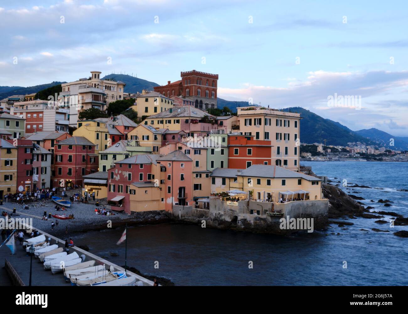 a long exposure photo of Boccadasse beach with the colorful houses and ...