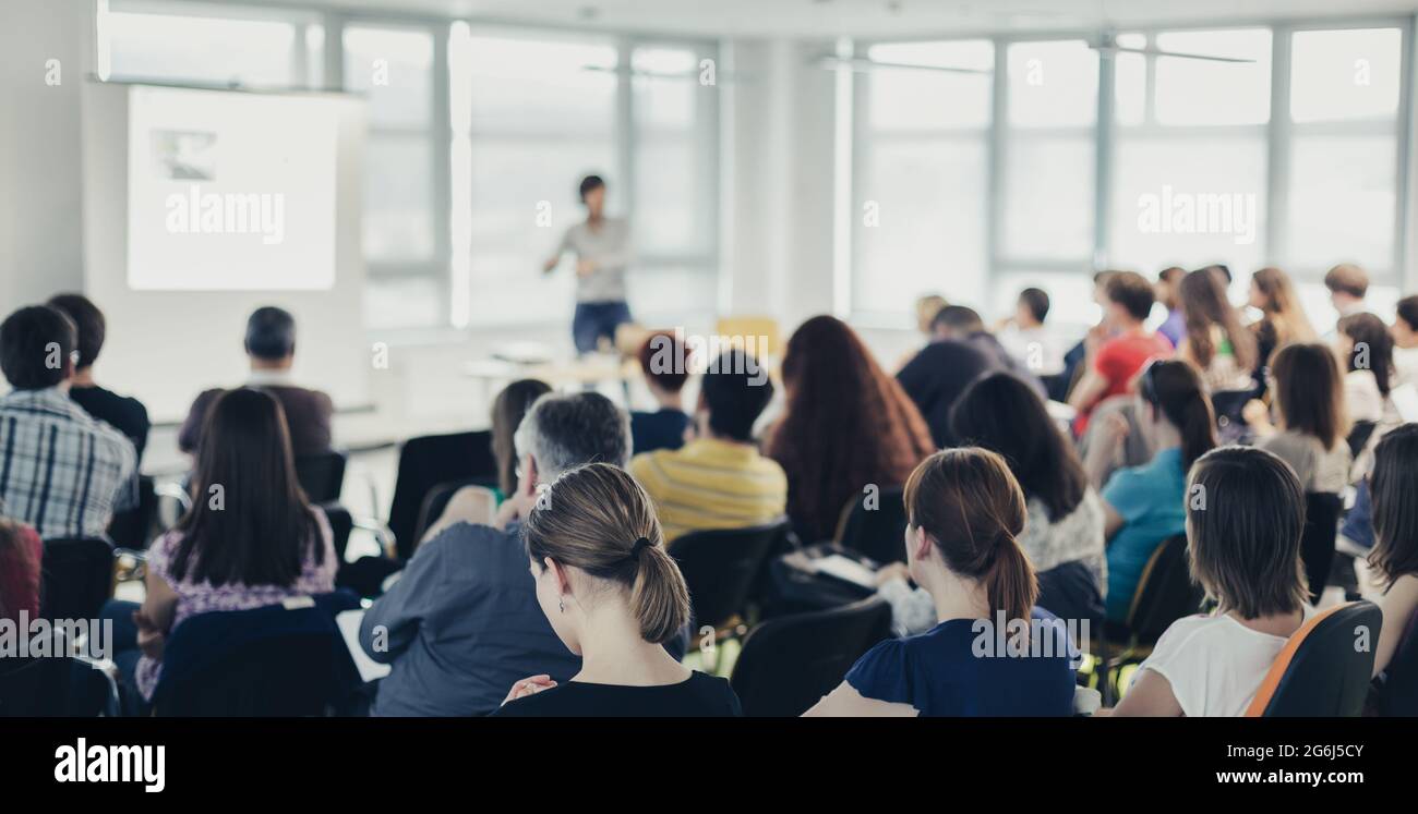Speaker giving presentation on business conference Stock Photo - Alamy