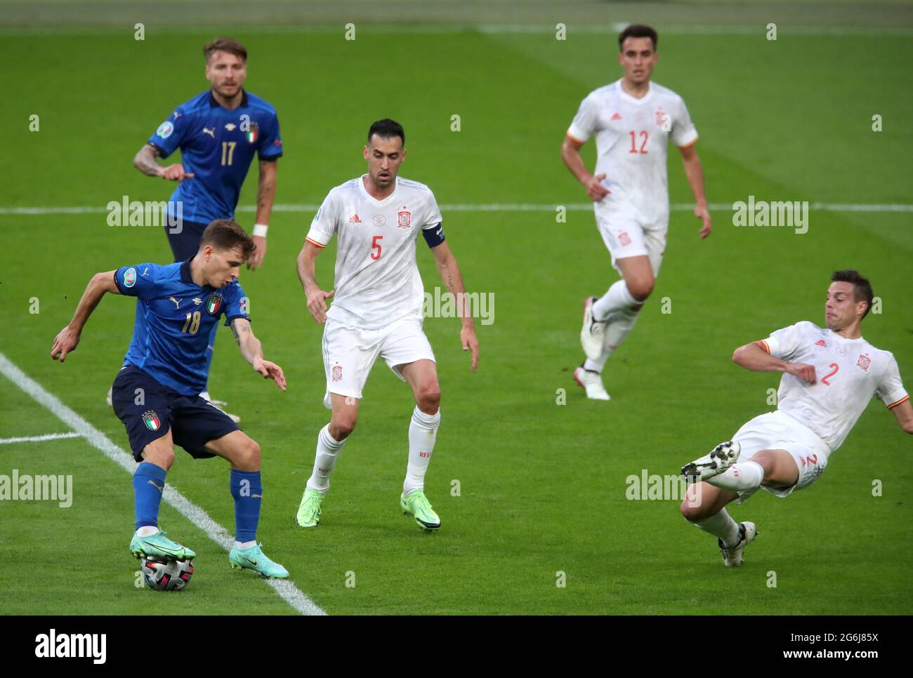 Italy's Nicolo Barella (left) prepares to shoot on goal during the UEFA ...