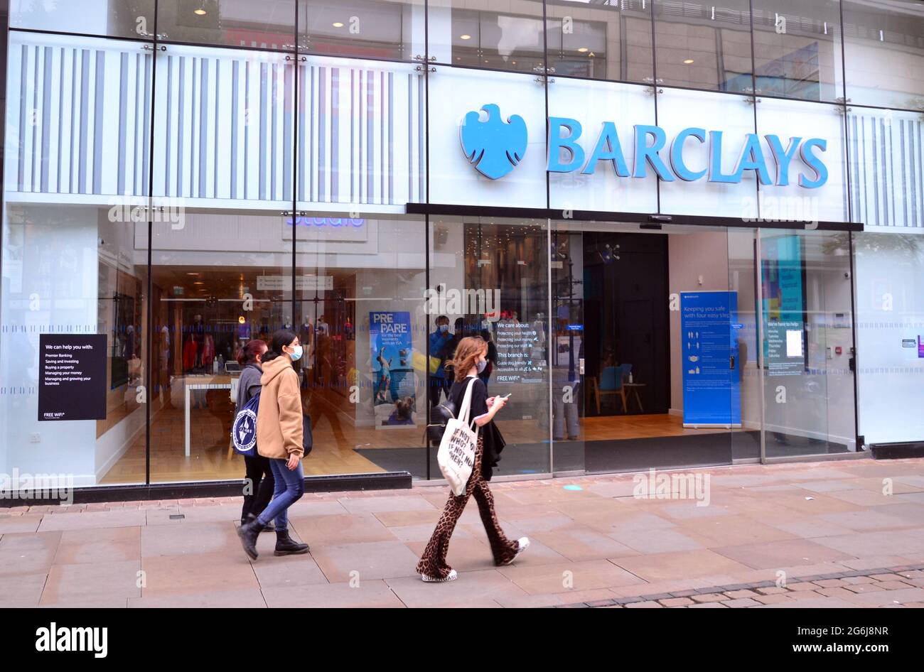 People outside a branch of Barclay's Bank in central Manchester, UK, in ...