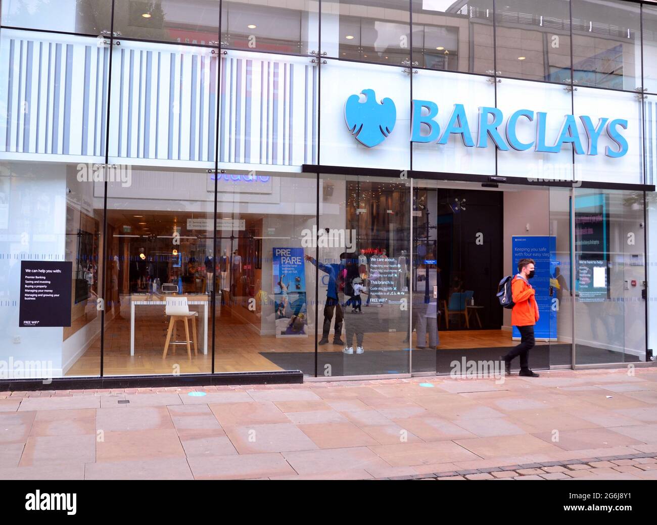 People outside a branch of Barclay's Bank in central Manchester, UK, in ...