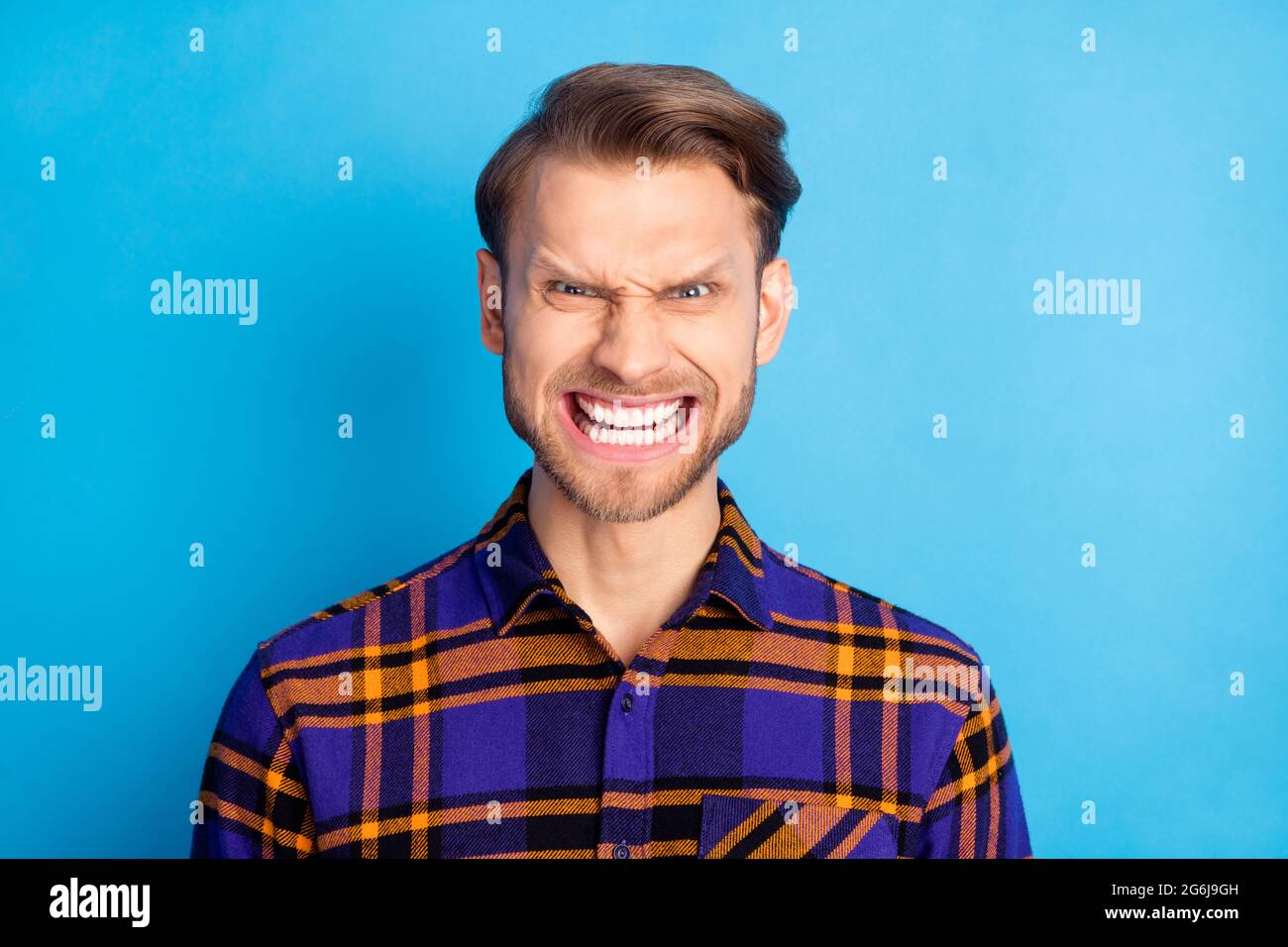 Photo of angry man crazy unhappy young man bad mood conflict isolated ...