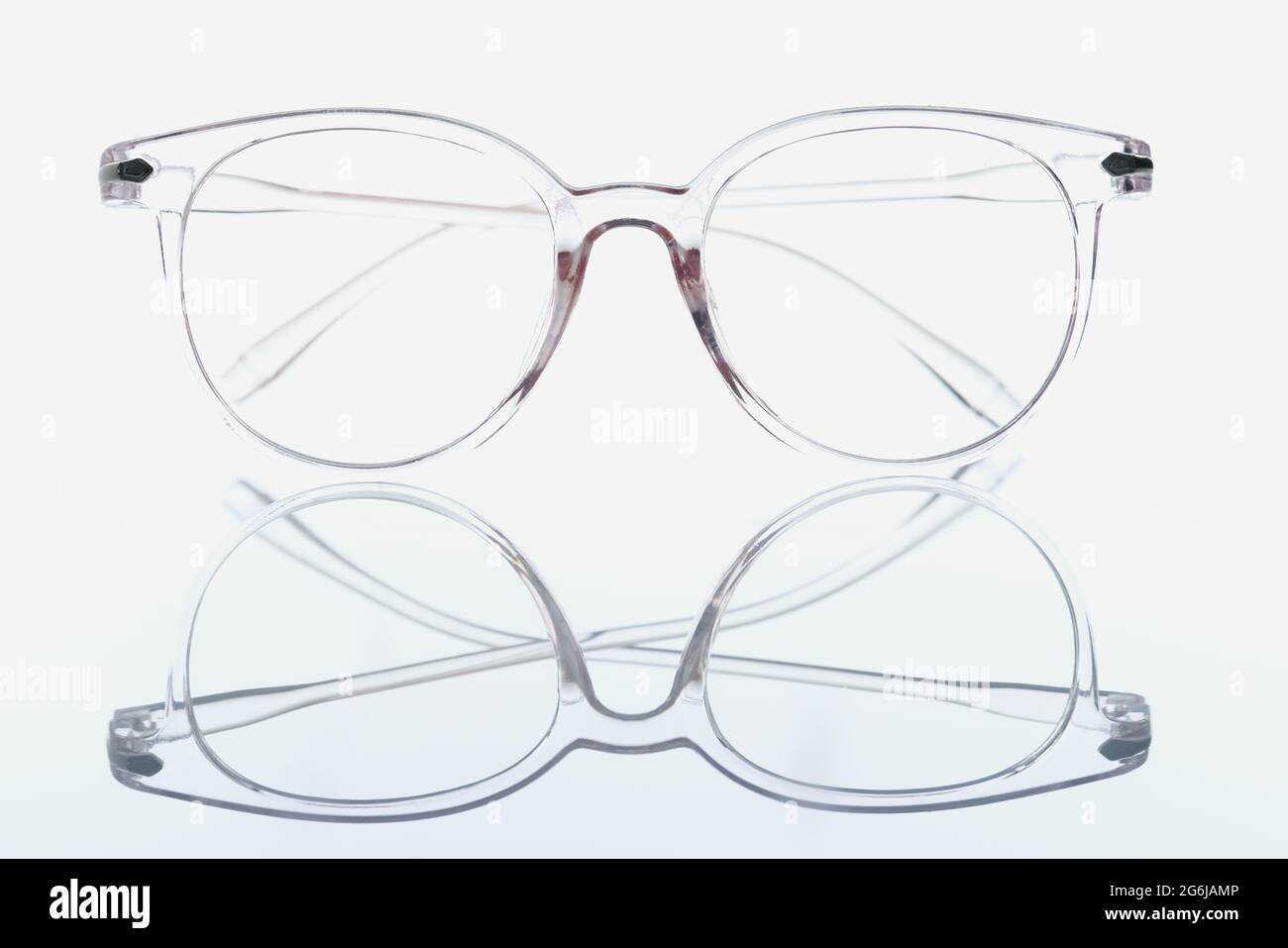 Closeup of transparent glasses for vision on white background with ...