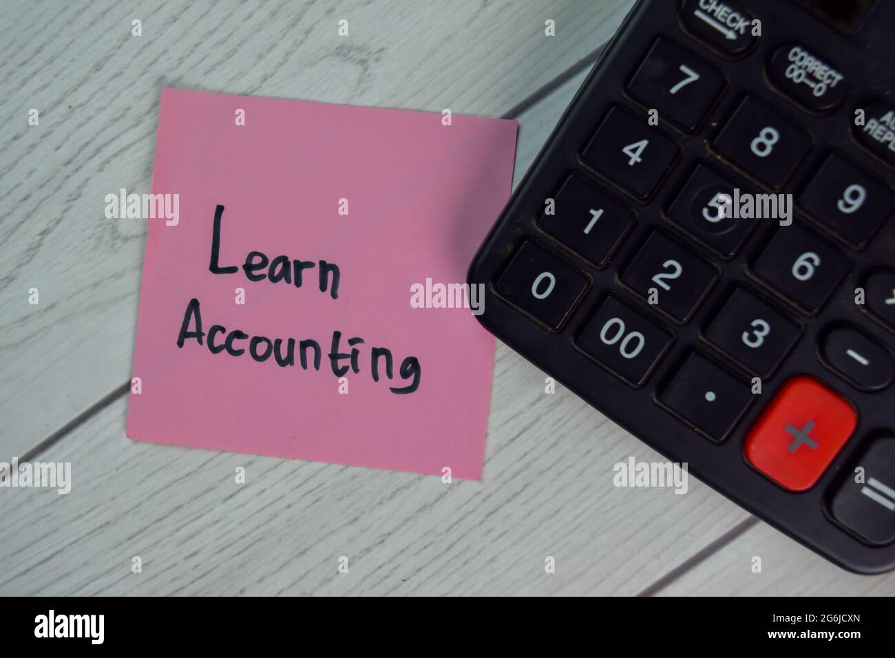 Learn Accounting write on sticky notes isolated on Wooden Table Stock ...
