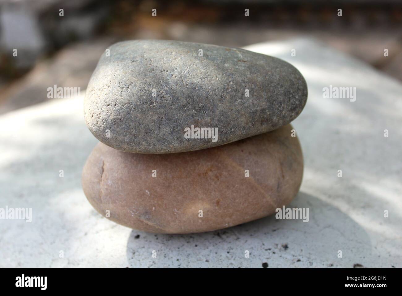 Rock sitting gently on another rock. Beautiful photo of nature Stock ...