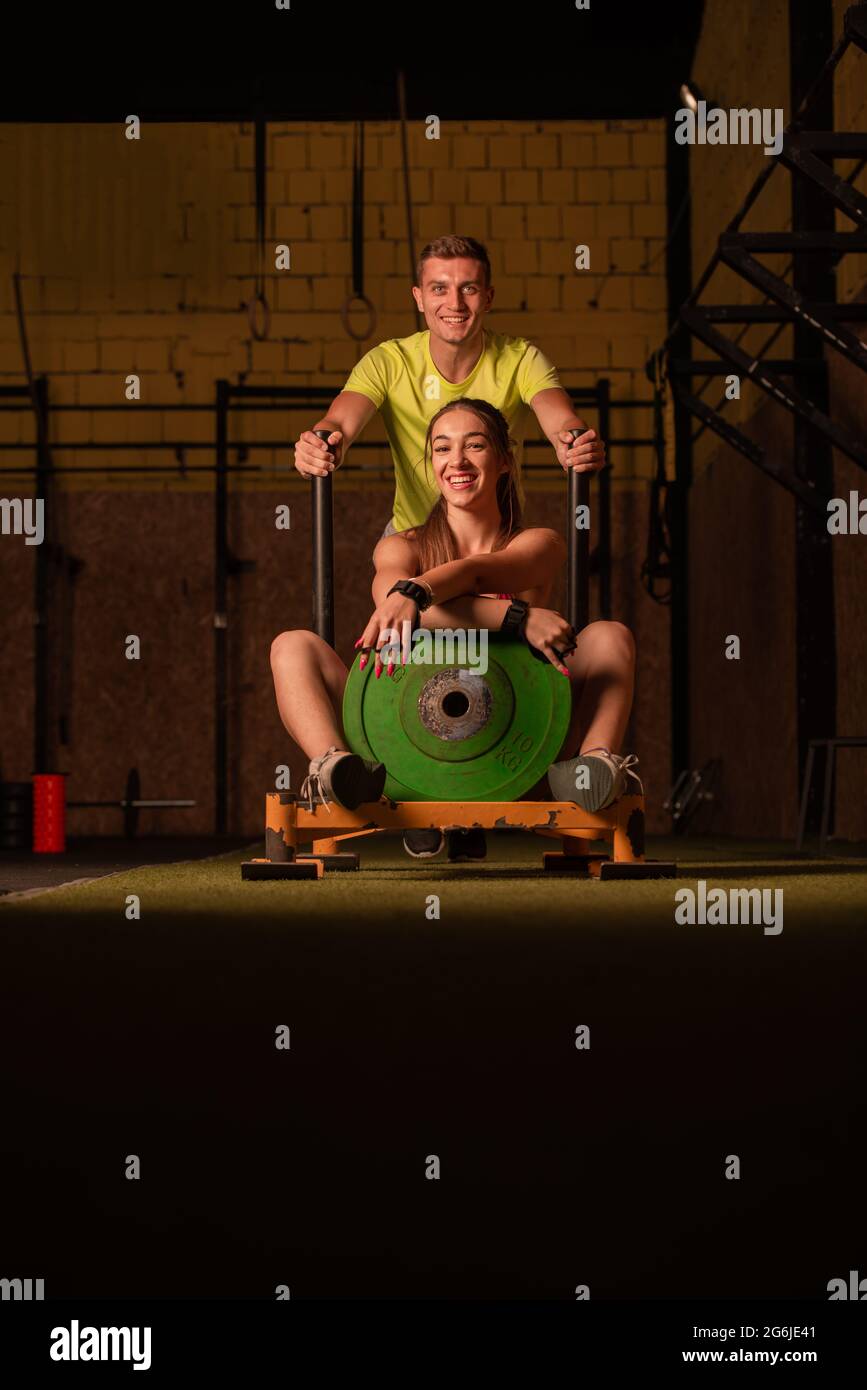 Couple is posing and training while smiling at each other Stock Photo ...