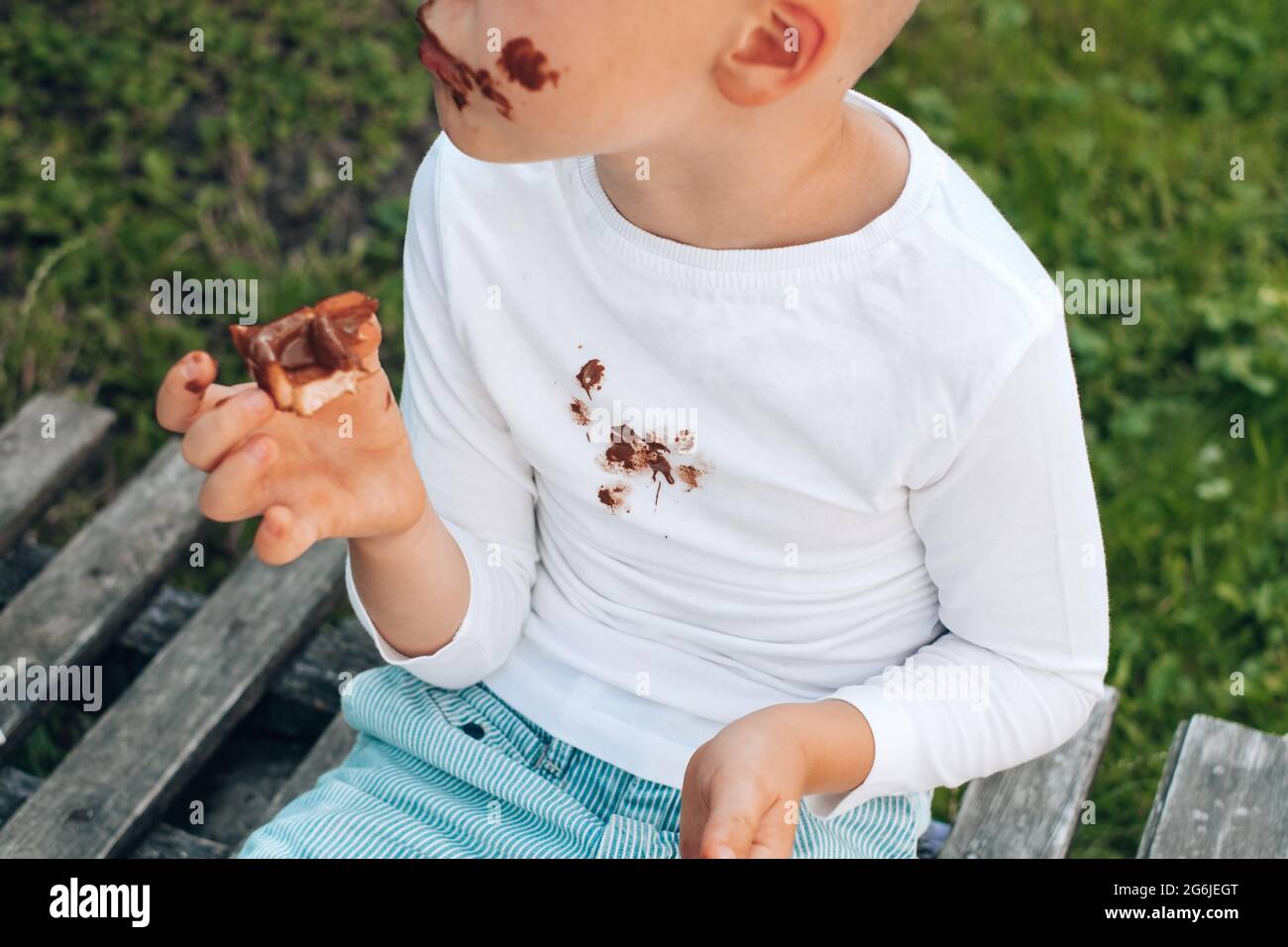 Boy eating chocolate messy hi-res stock photography and images - Alamy