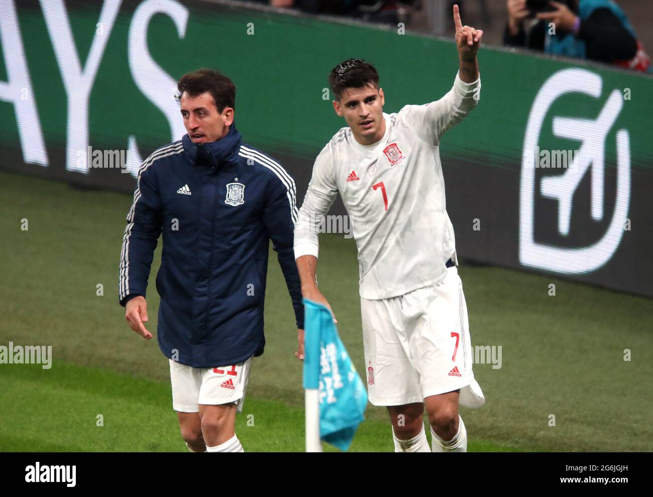 Spain's Alvaro Morata (right) celebrates scoring their side's first ...