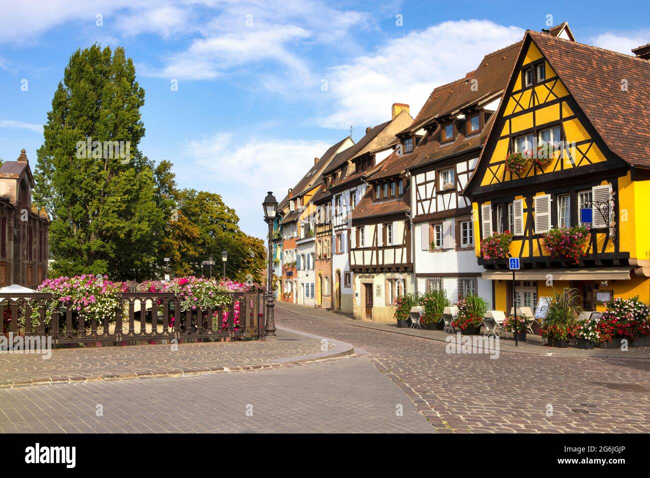 Blue sky and white clouds over colourful Colmar village. Famous ...