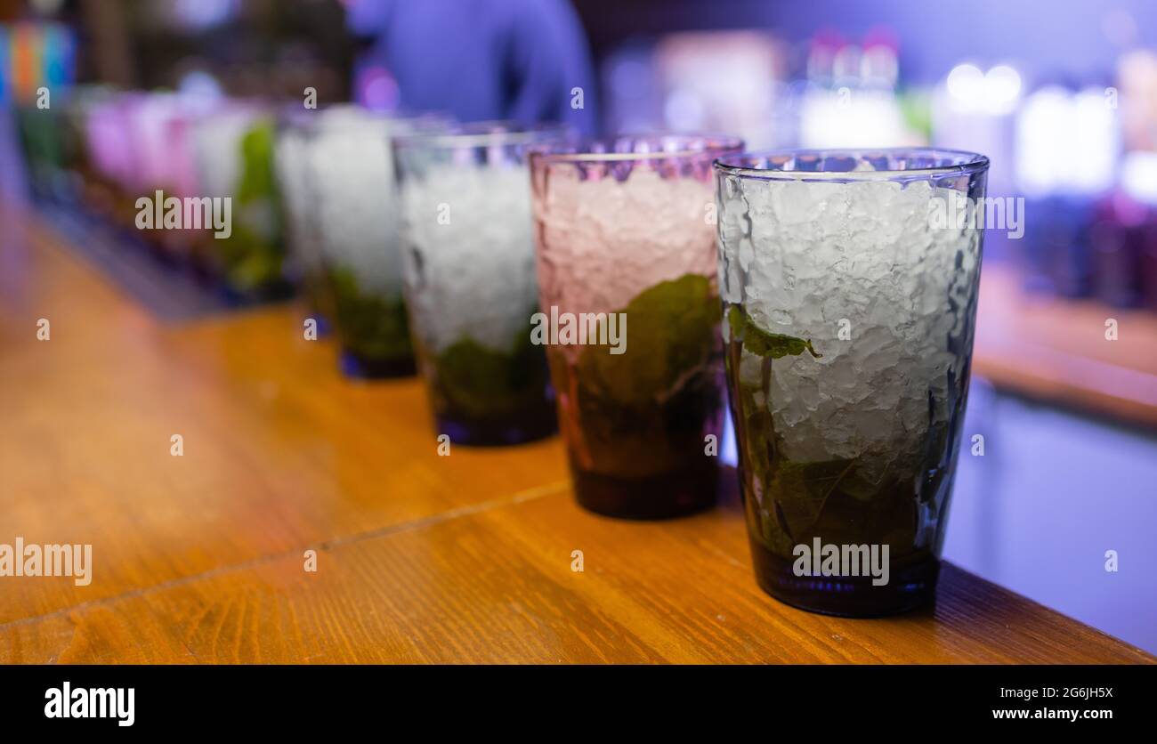 Bartender mixing cocktail outdoors bar hi-res stock photography and ...