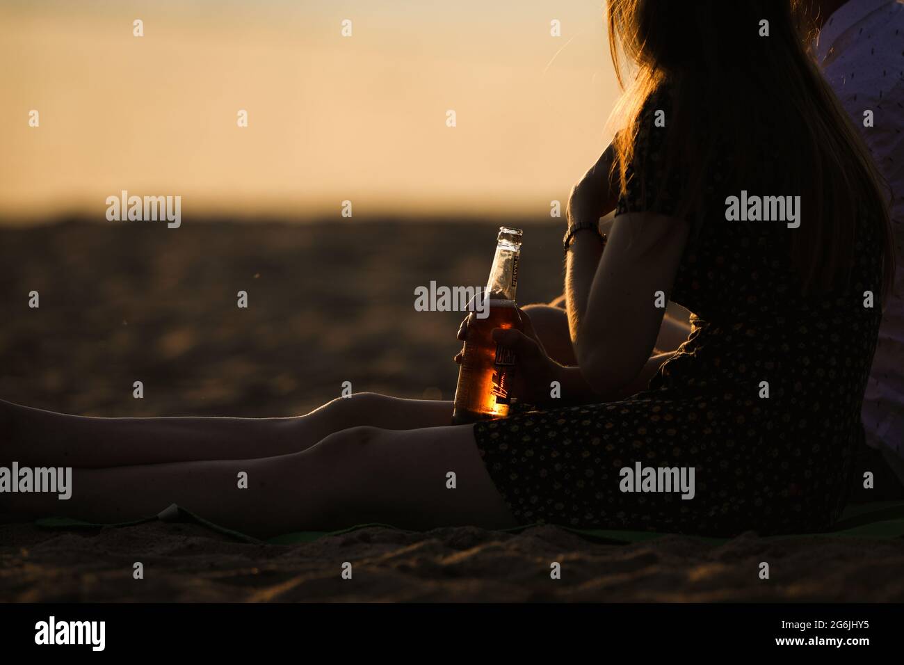 People are seen enjoying the warm weather at at a beach on the Vistula ...