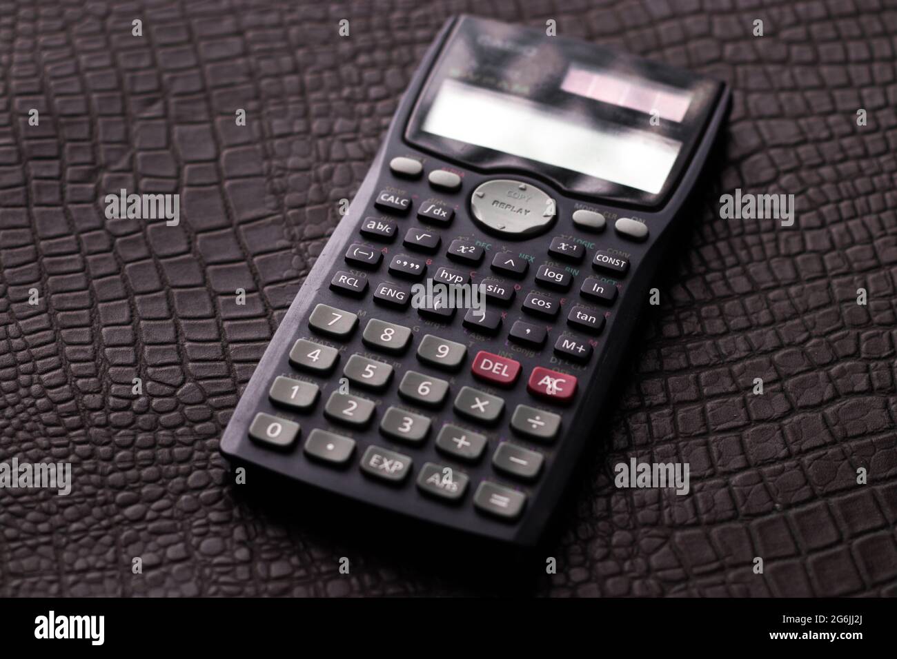 Scientific Calculator on a white background stock image Stock Photo - Alamy