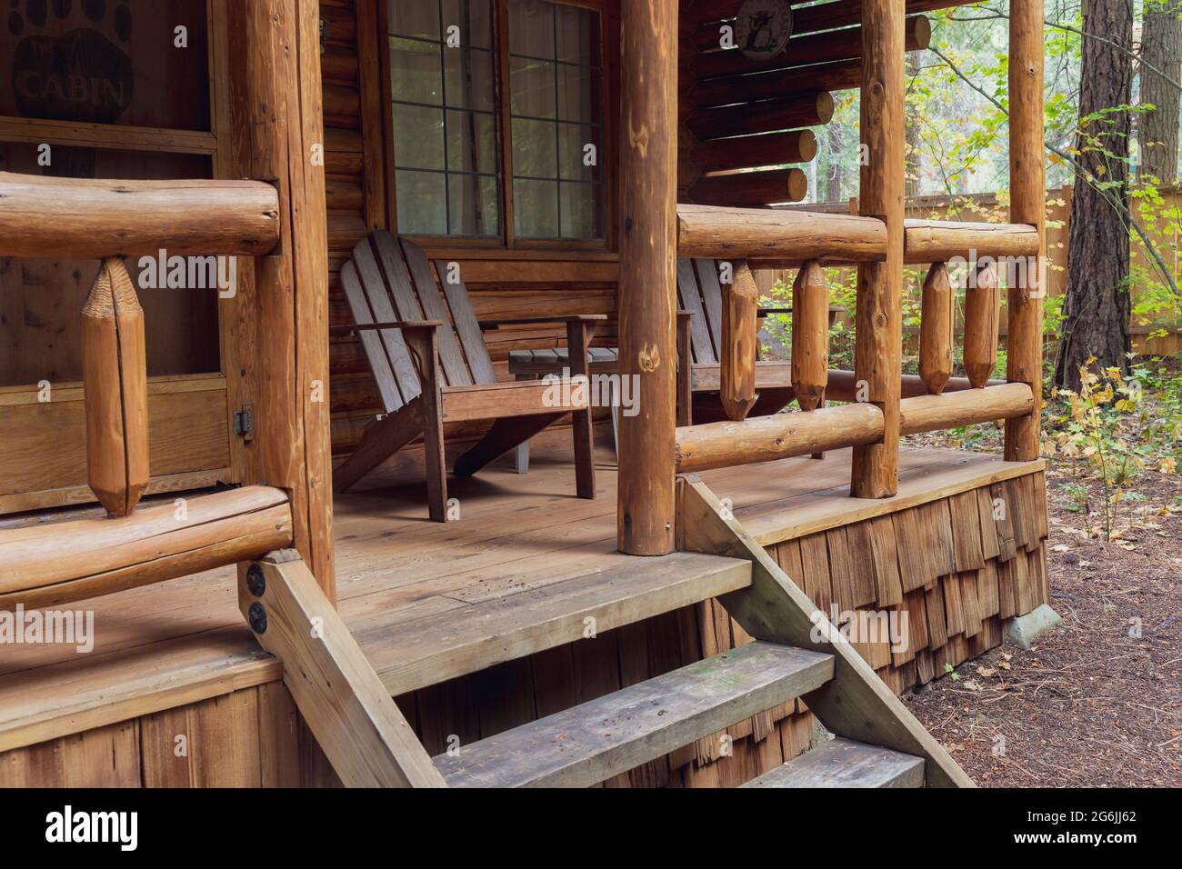 View of Front Porch of Rustic Log Cabin in the Woods Stock Photo - Alamy