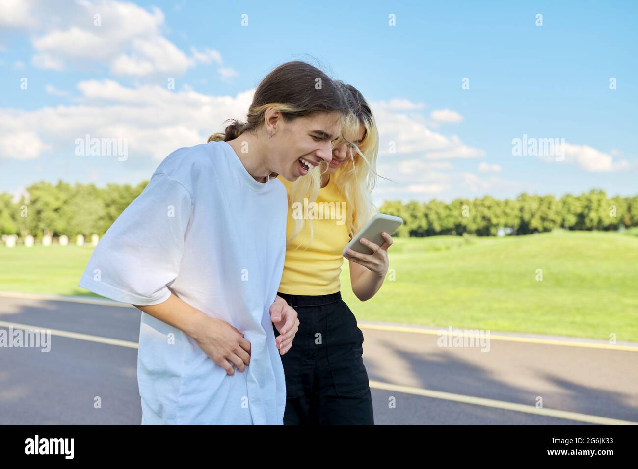 Boy filming friends hi-res stock photography and images - Alamy
